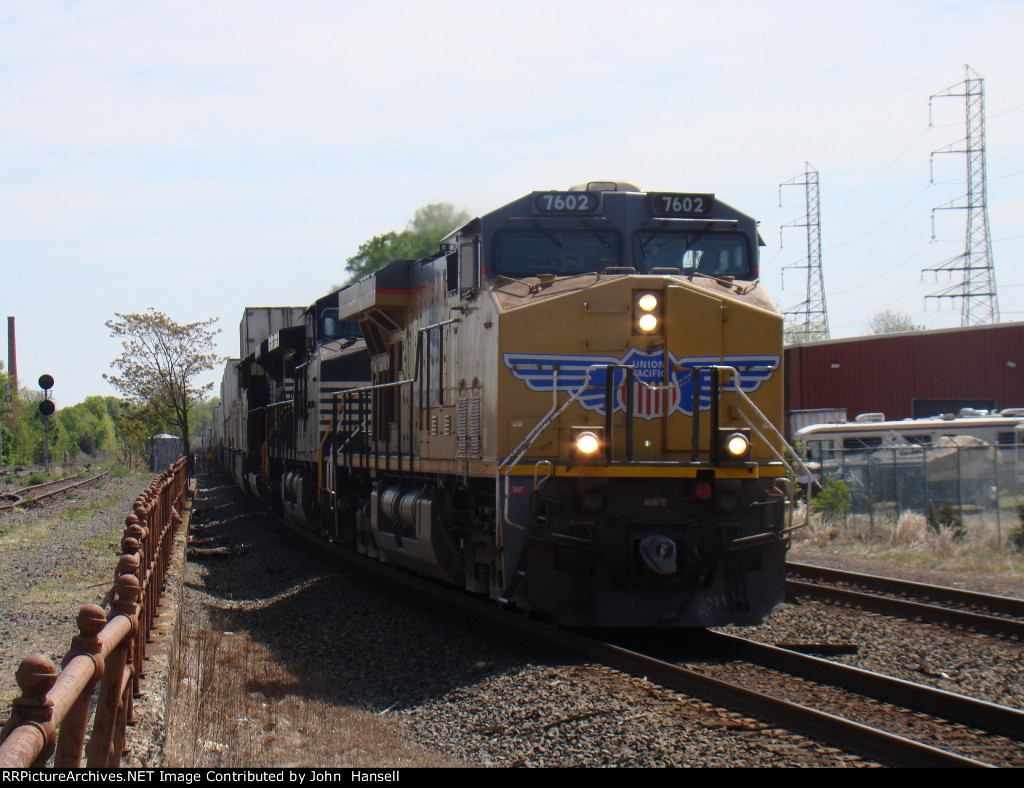 UP 7602 on NS 211